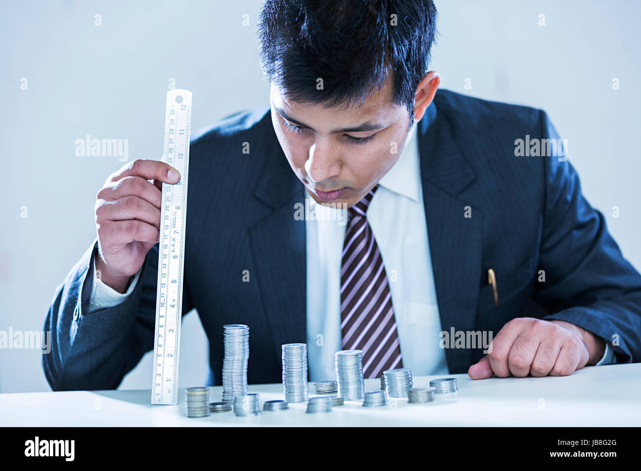 Ruler and coins hi-res stock photography and images - Alamy