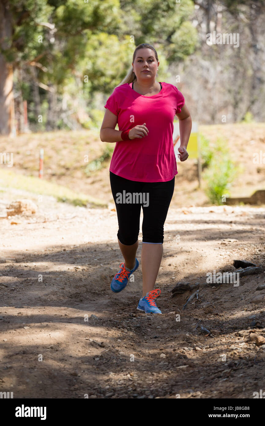 Overweight woman jogging hi-res stock photography and images - Alamy