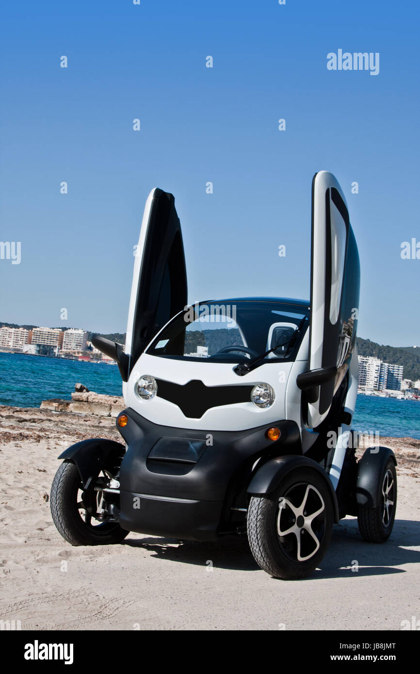 Electric car and beach background Stock Photo - Alamy