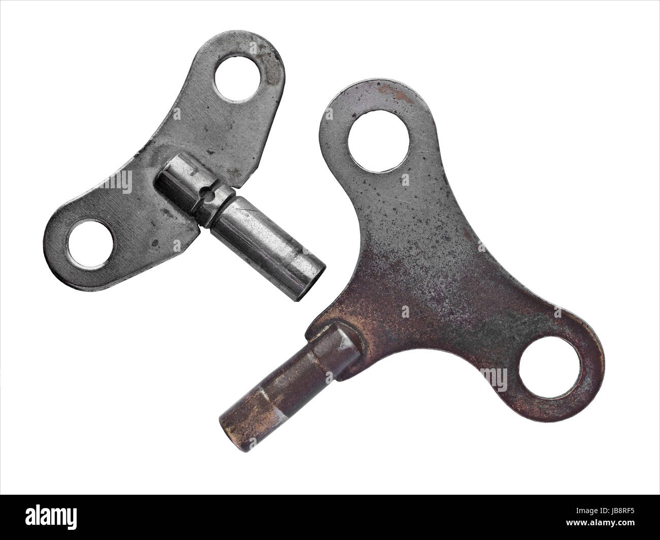 pair of vintage wind clock keys over white, clipping path Stock Photo ...