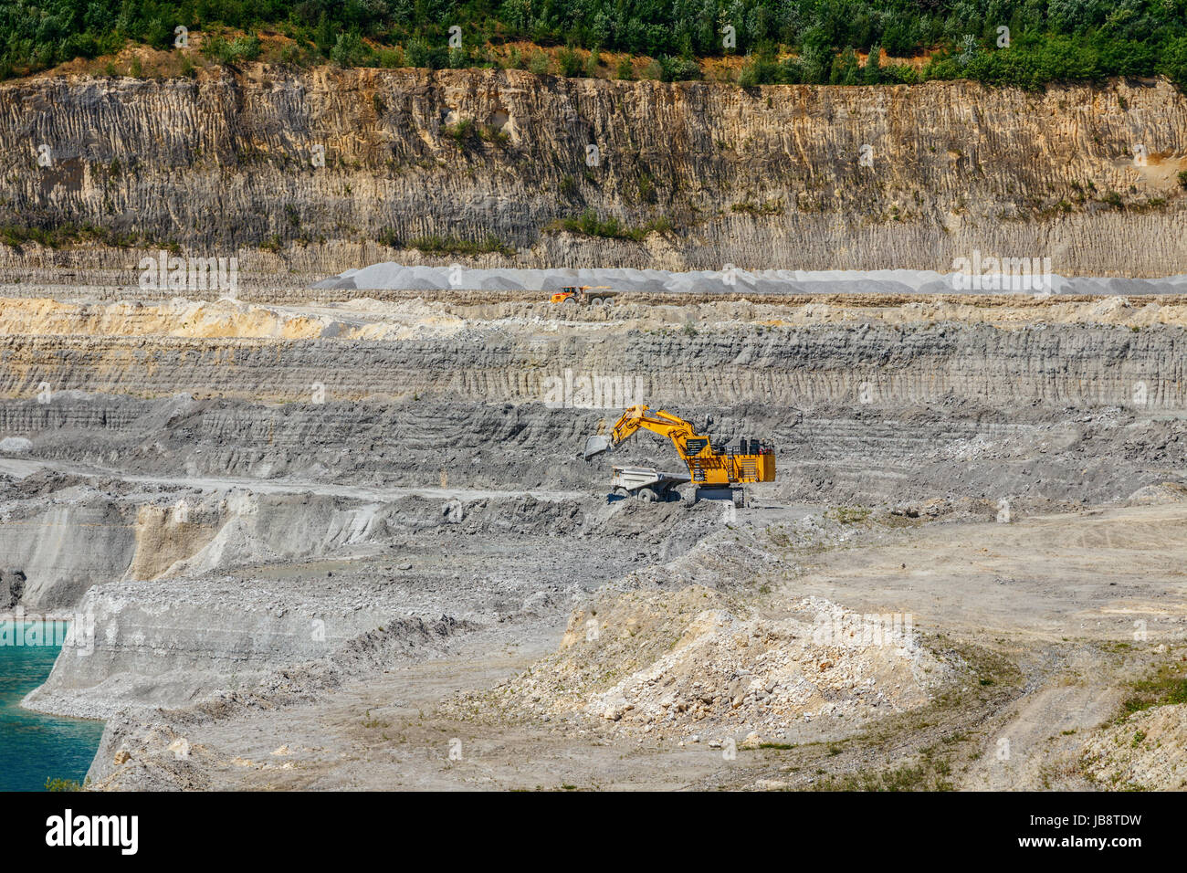 View of the ENCI (First Dutch Cement Industry) quary with dump trucks ...