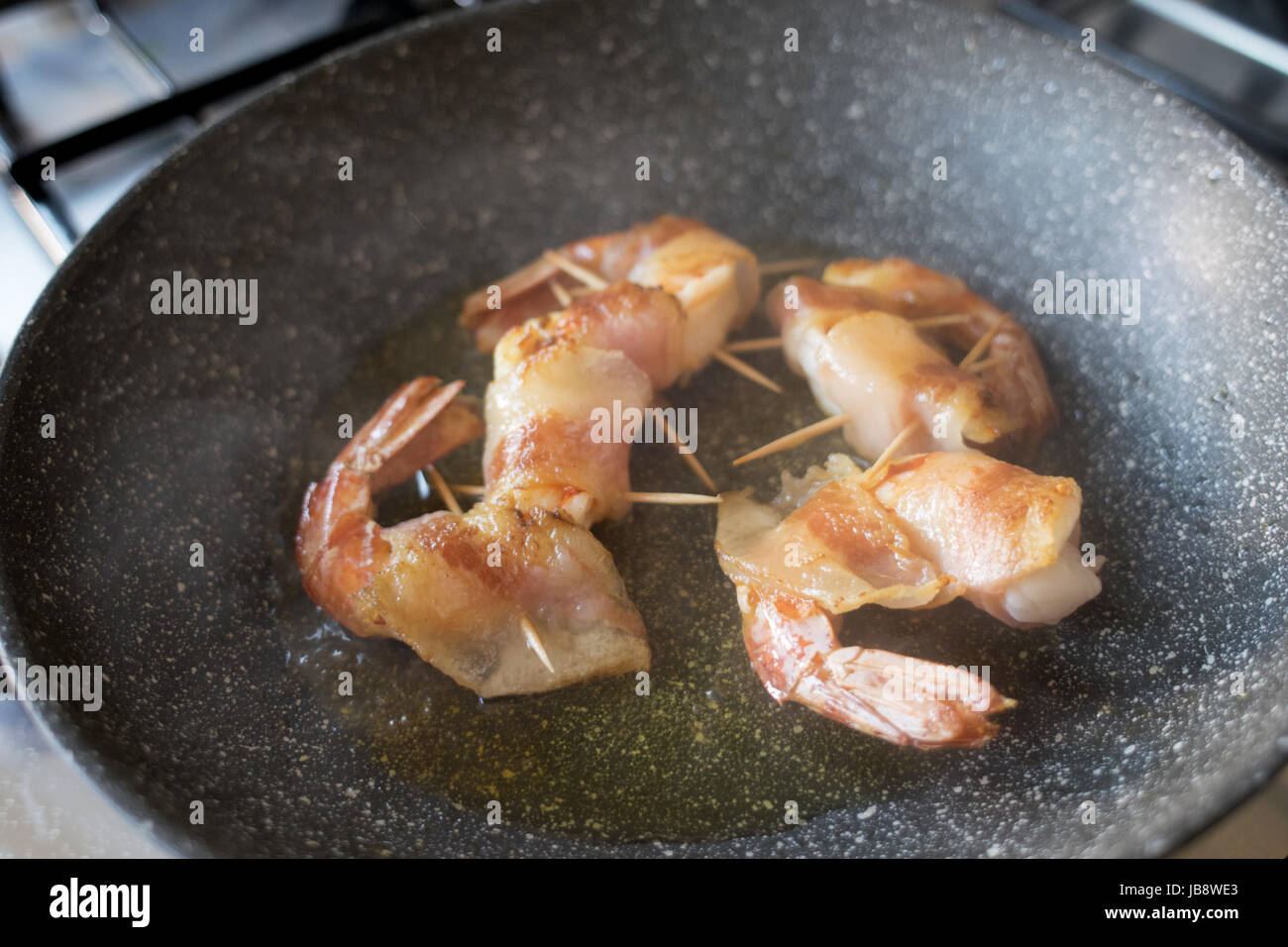 Bacon wrapped prawns hi-res stock photography and images - Alamy