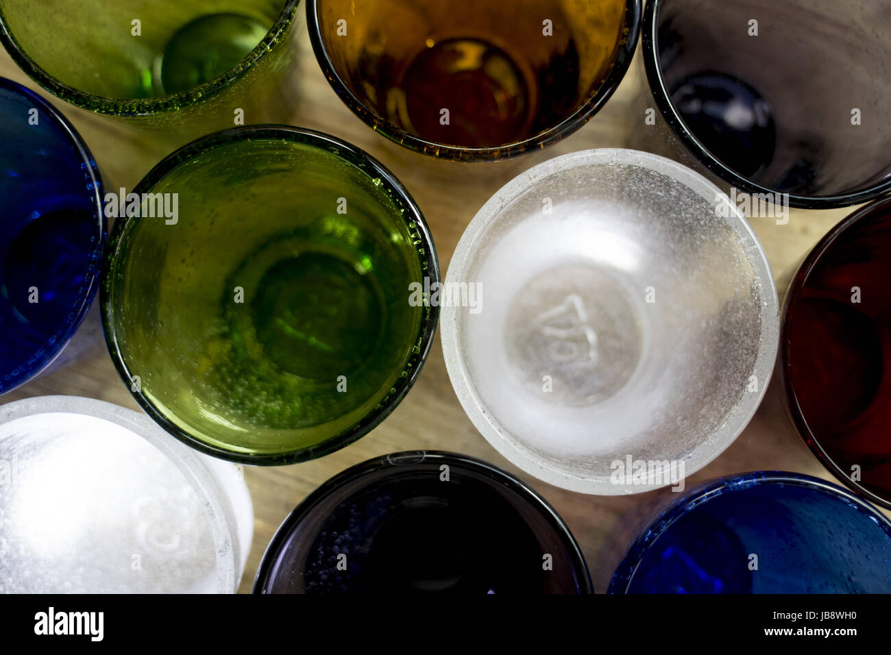 series of colored glasses with top view Stock Photo - Alamy