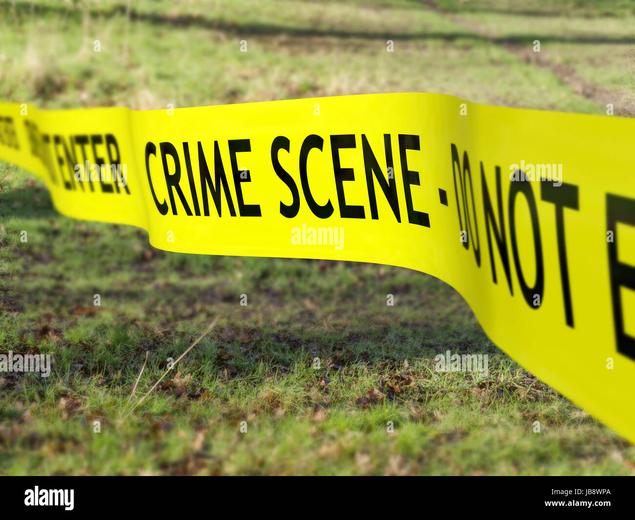 Crime scene tape being used to protect a criminal investigation Stock ...
