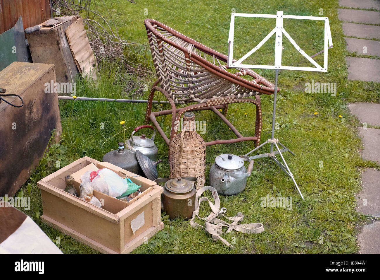 Various unwanted items spread out in a backyard, outdoor image Stock ...