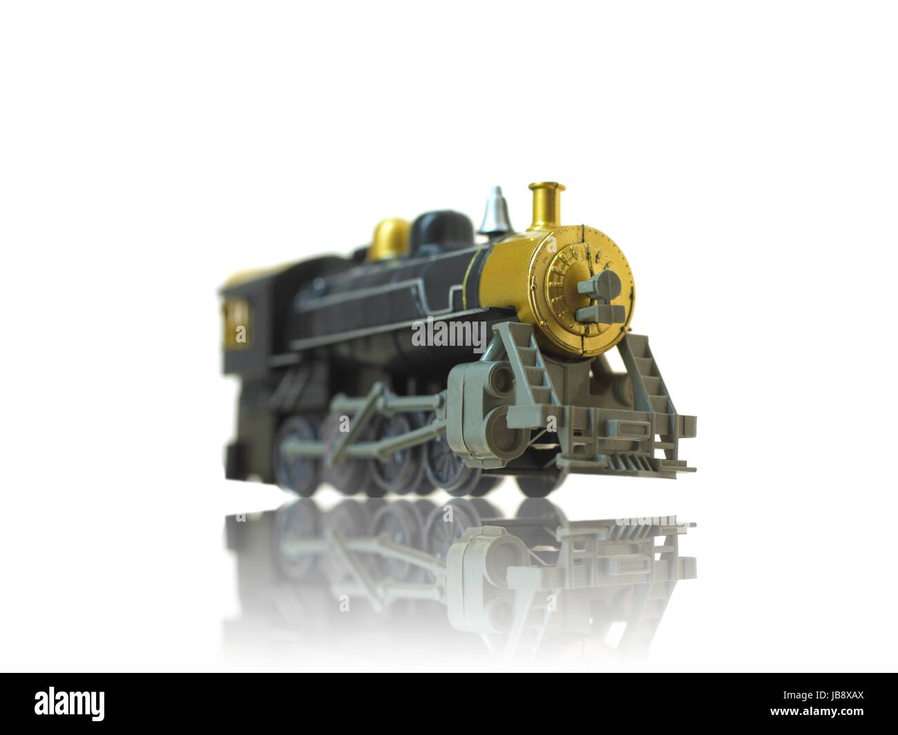 A toy train isolated against a white background Stock Photo - Alamy