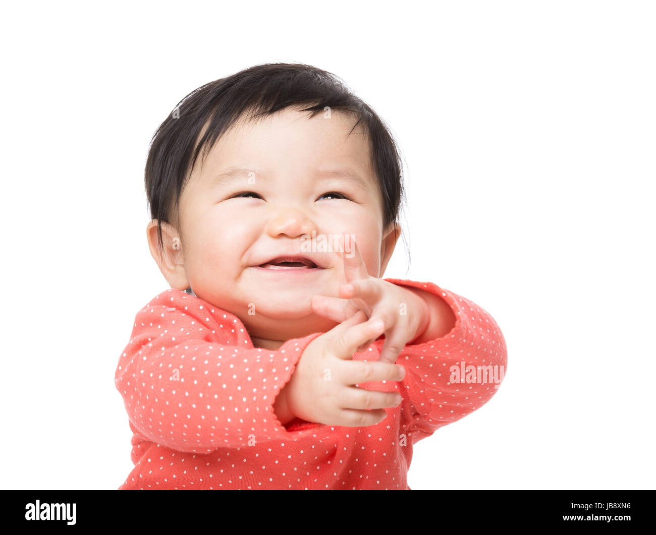 Baby girl feeling excited Stock Photo - Alamy