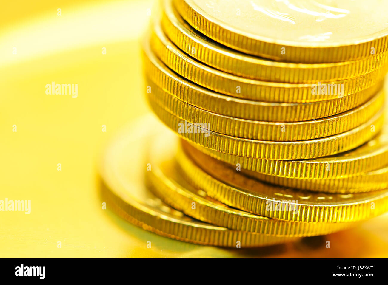 Gold coins close up Stock Photo - Alamy