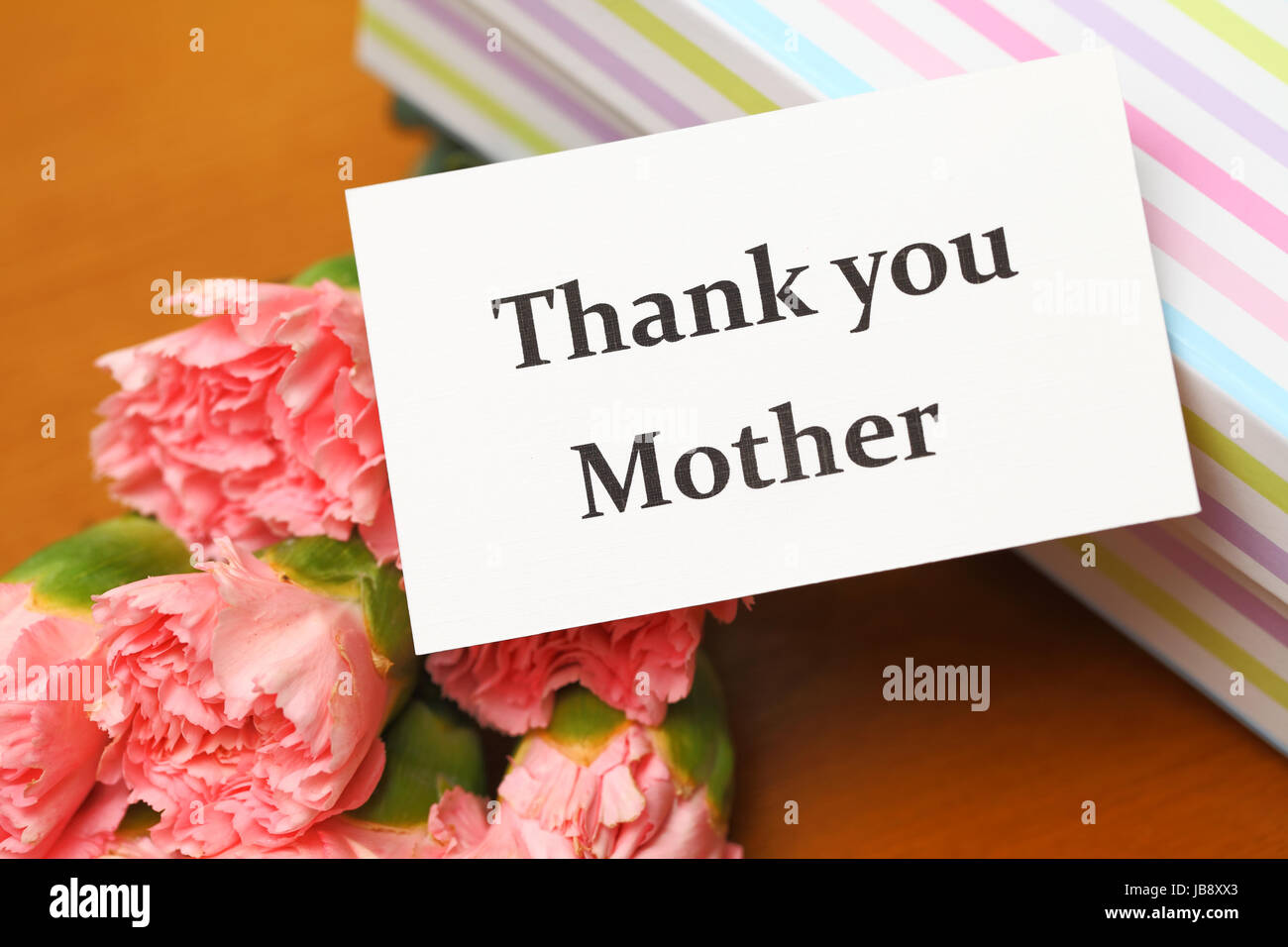 Thank you card mother with carnation and gift box Stock Photo - Alamy