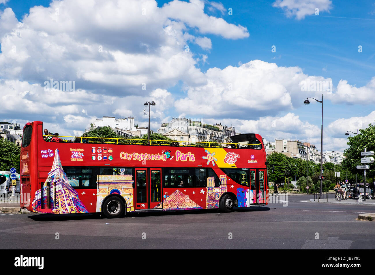A sightseeing bus in the streets of Paris, France Stock Photo - Alamy