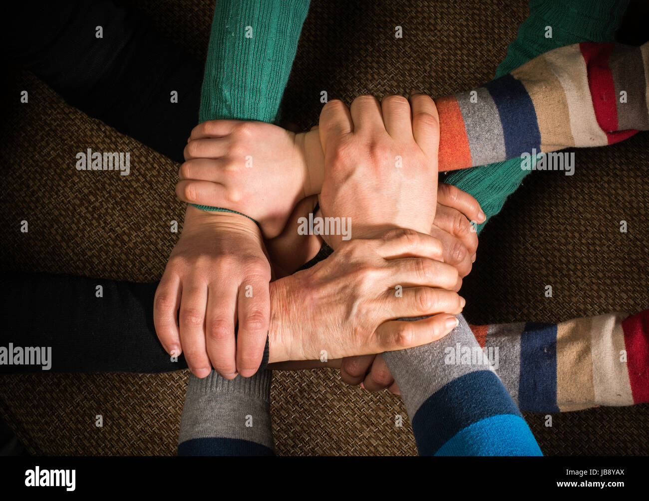 Many hands helping hi-res stock photography and images - Alamy