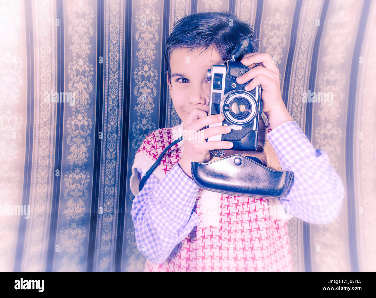 Boy with vintage camera. Vintage clothes Stock Photo - Alamy