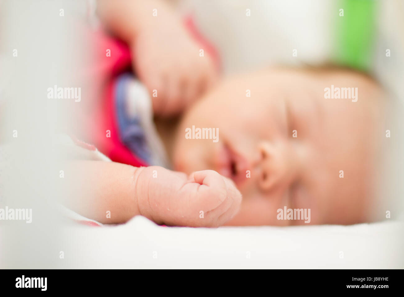 Cute newborn baby sleeping three days old Stock Photo - Alamy