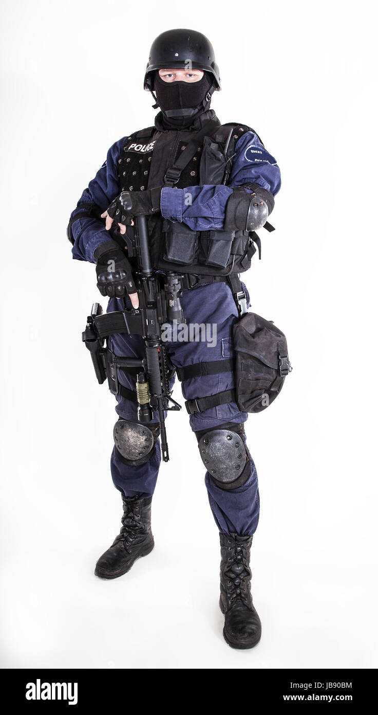 Special weapons and tactics (SWAT) team officer with his gun Stock ...