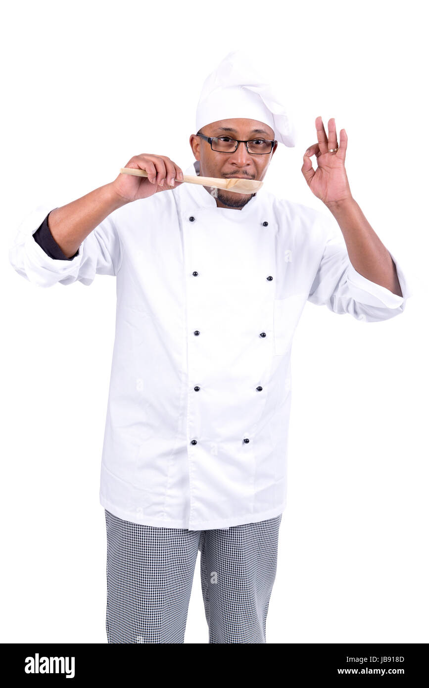 Male chef with wooden spoon isolated on white background Stock Photo ...