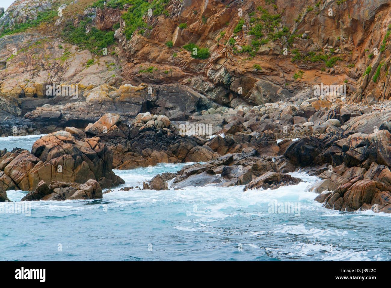 rocky and clefty coastal detail at the Seven Islands in Brittany ...