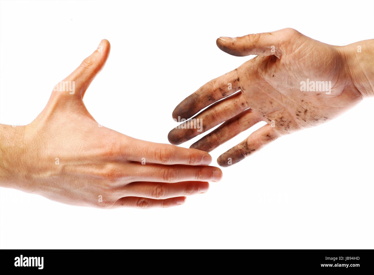 Handshake with a dirty hand and a clean one Stock Photo - Alamy
