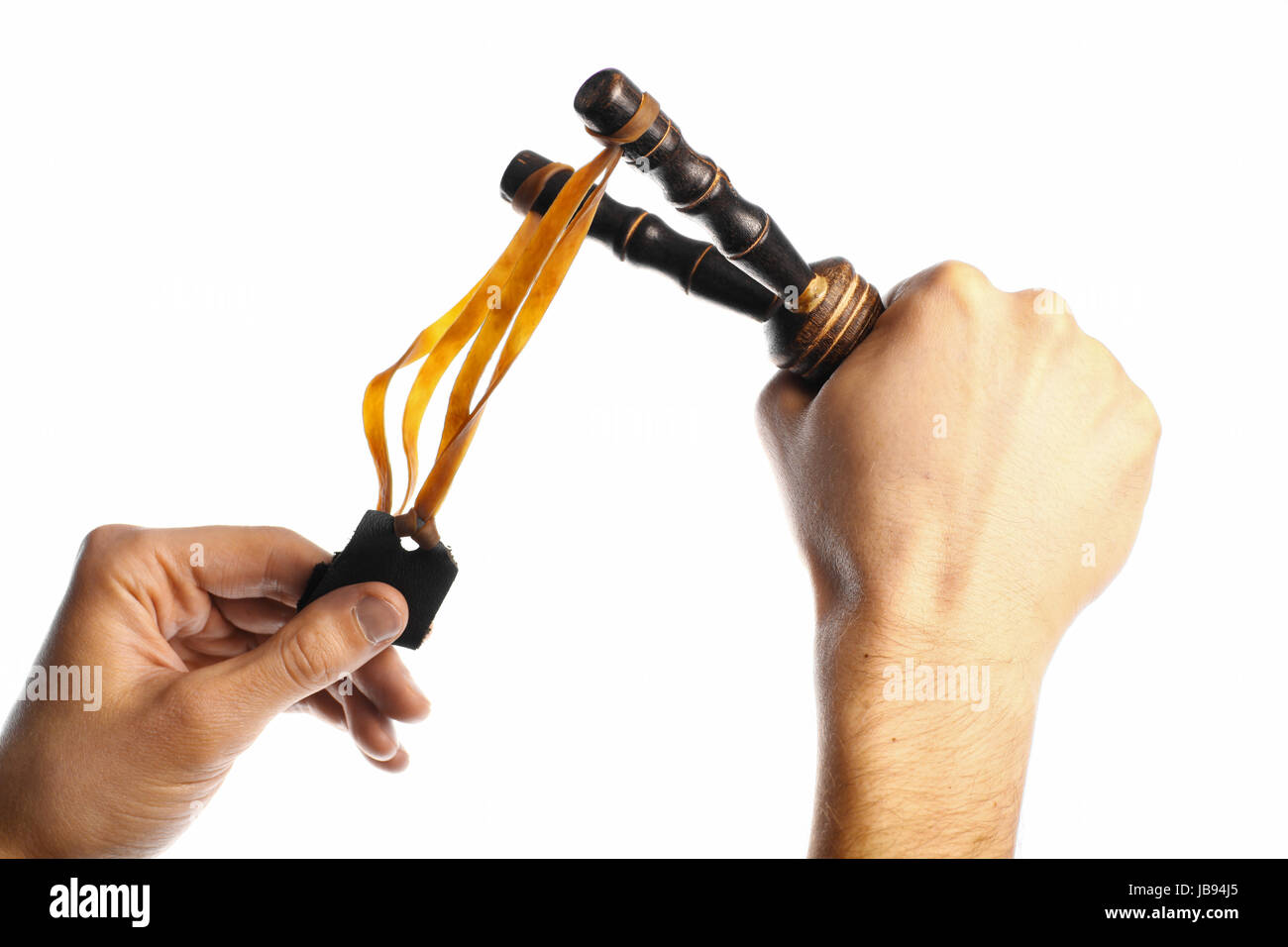 Color shot of a vintage slingshot, on white Stock Photo - Alamy