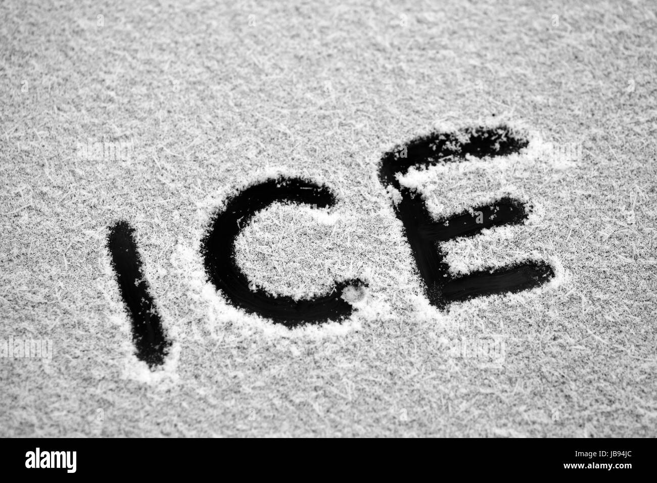 The word "ICE" is written in the snow Stock Photo - Alamy