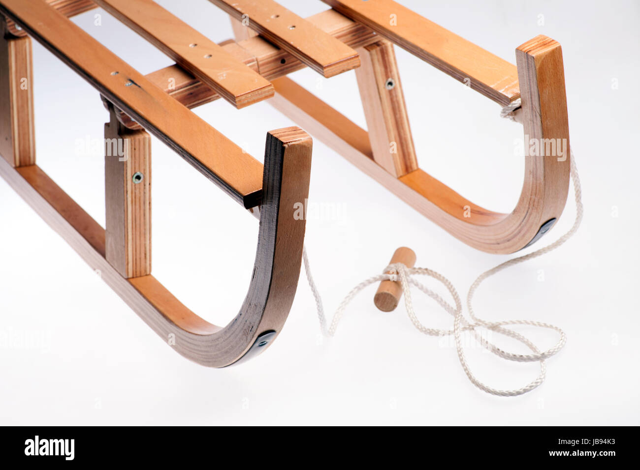 Color picture of a vintage wooden sledge isolated on white Stock Photo ...