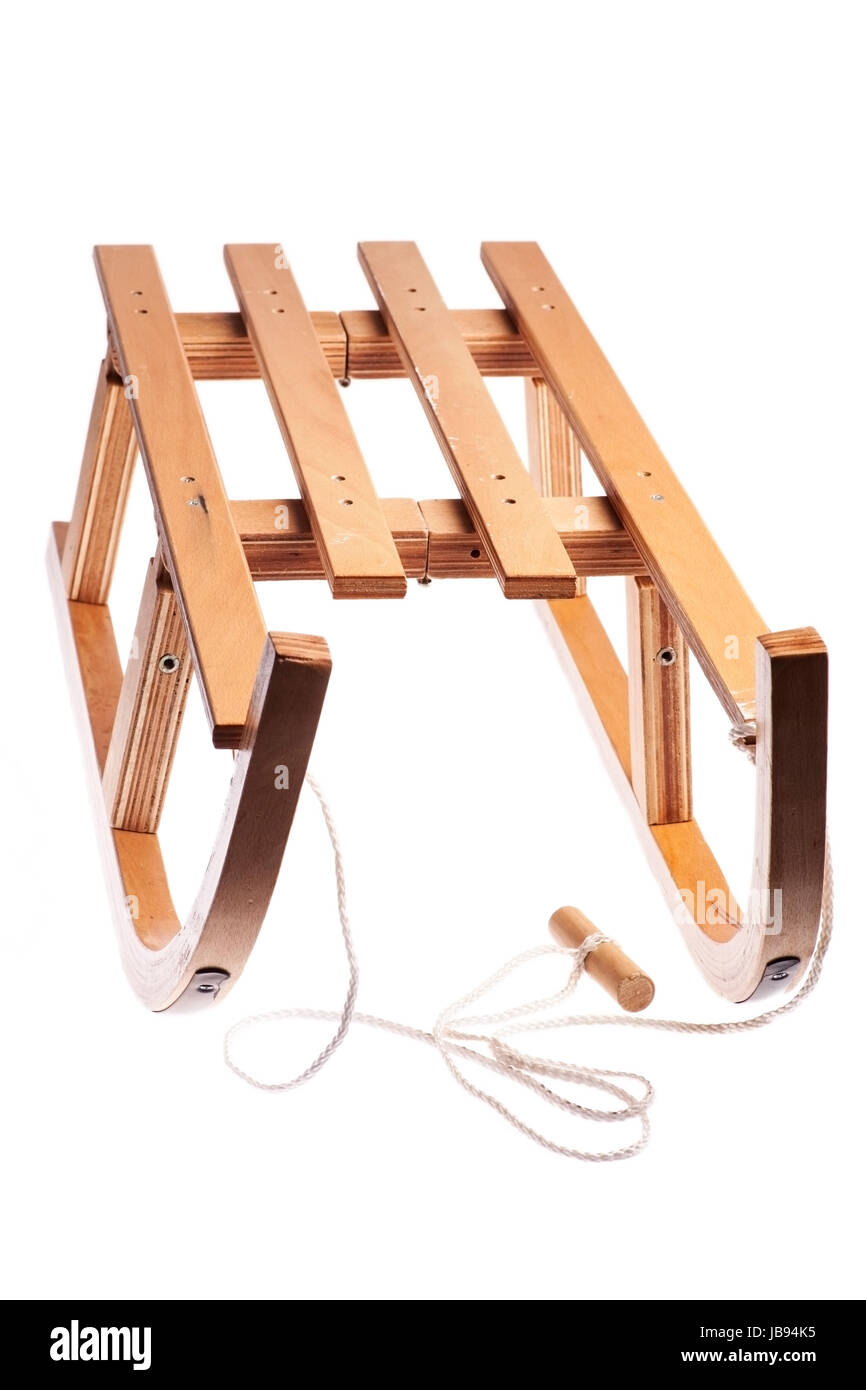 Color picture of a vintage wooden sledge isolated on white Stock Photo ...