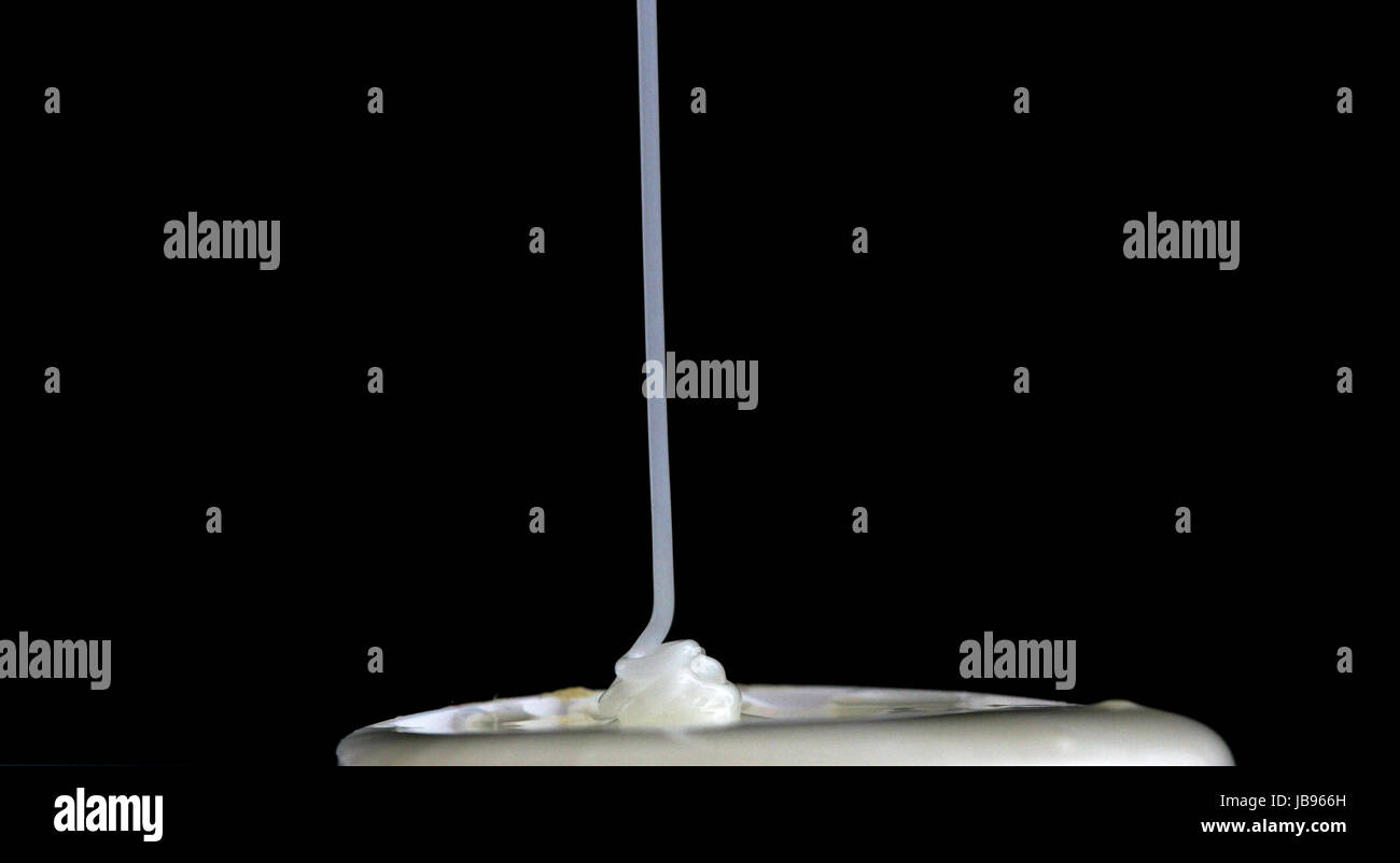 image of a Shampoo pouring out from the bottle Stock Photo - Alamy