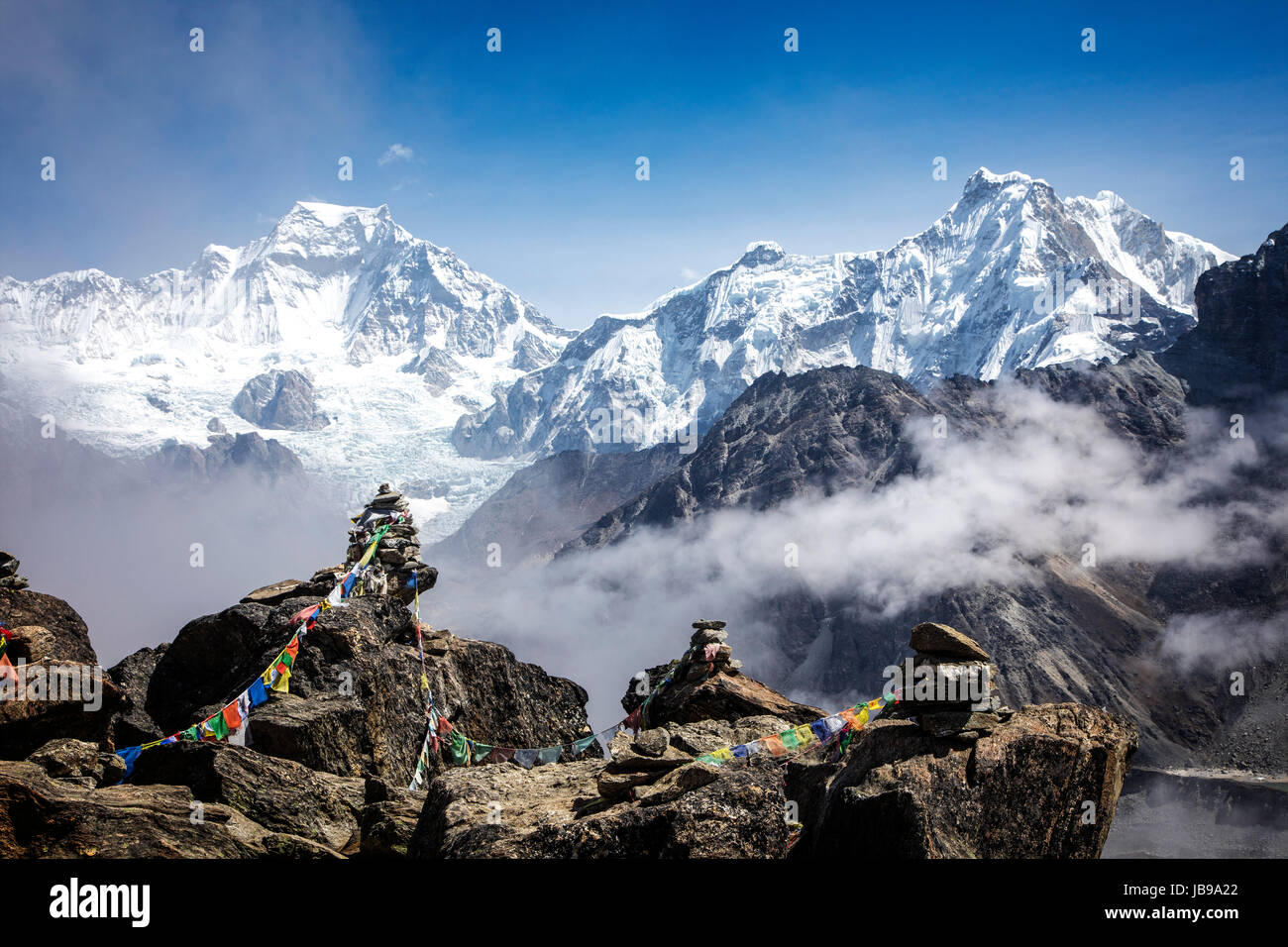 Cho oyu at 8188 meters (left) from the prayer flag covered summit of ...