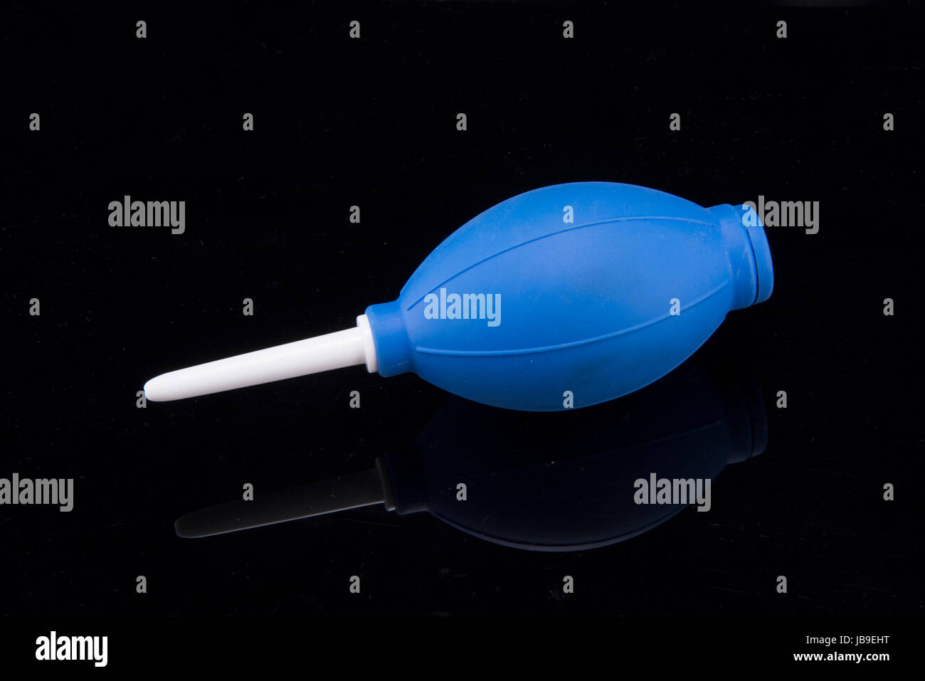 Blue plastic inflatable tools, black background Stock Photo - Alamy