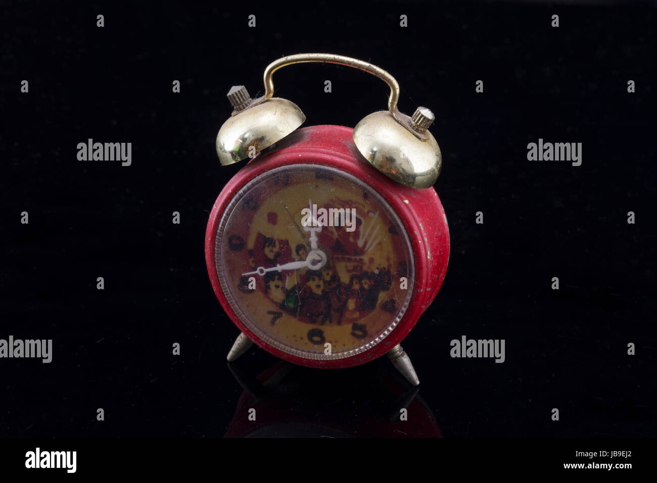red alarm clock, taken in the black background Stock Photo - Alamy
