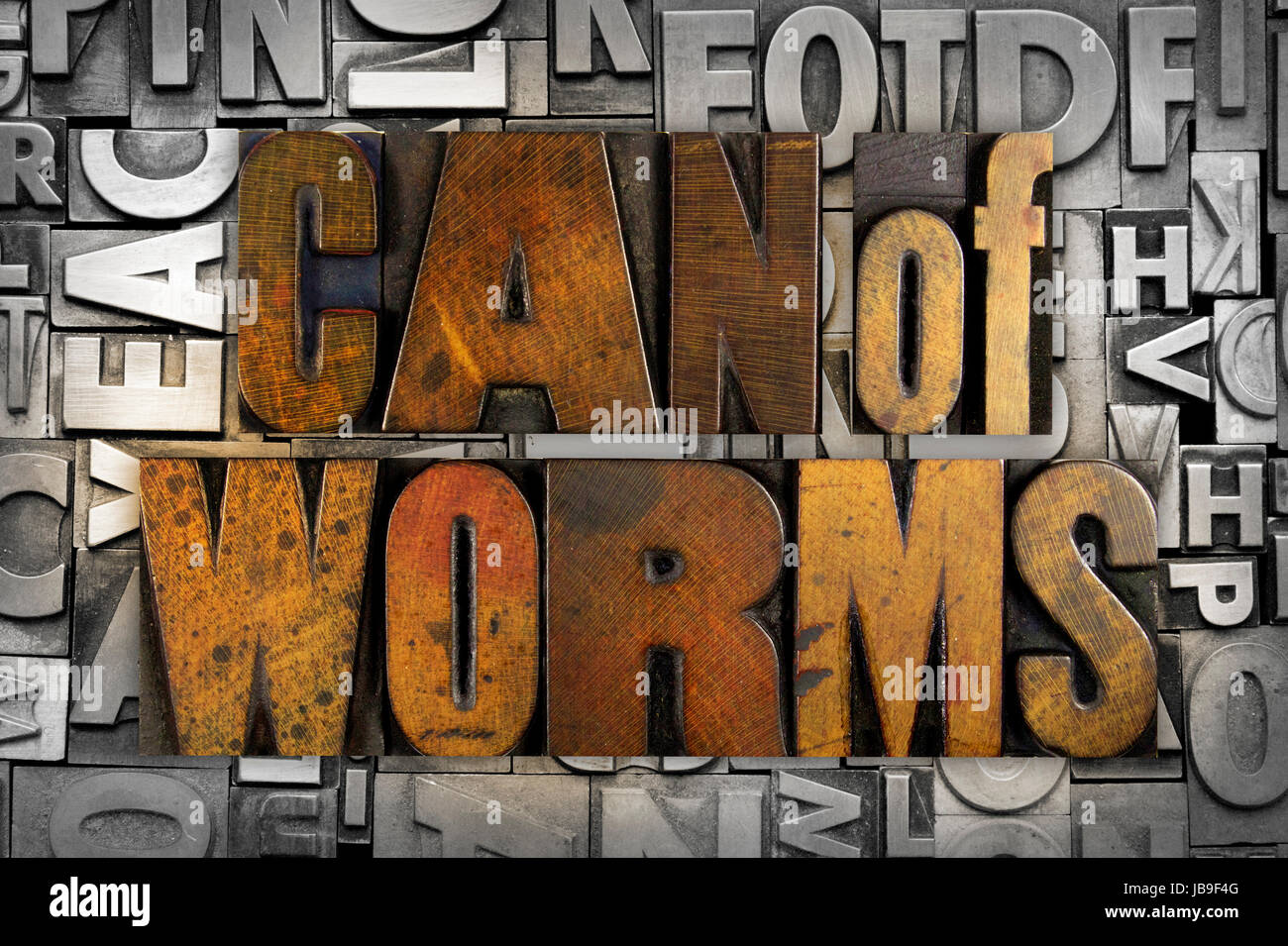 Thw words CAN OF WORMS written in vintage letterpress type Stock Photo ...