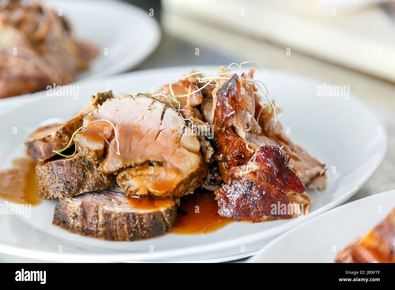 Preparing meat on the table in the kitchen Stock Photo - Alamy