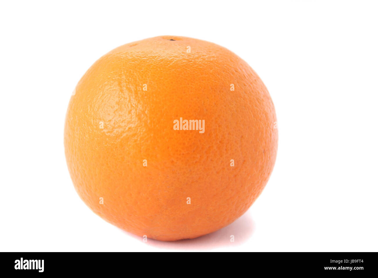 One mature orange orange by CU on a white background Stock Photo - Alamy