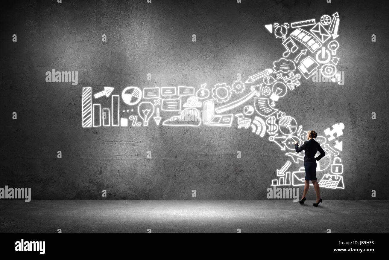 Woman throwing light on her ideas Stock Photo - Alamy