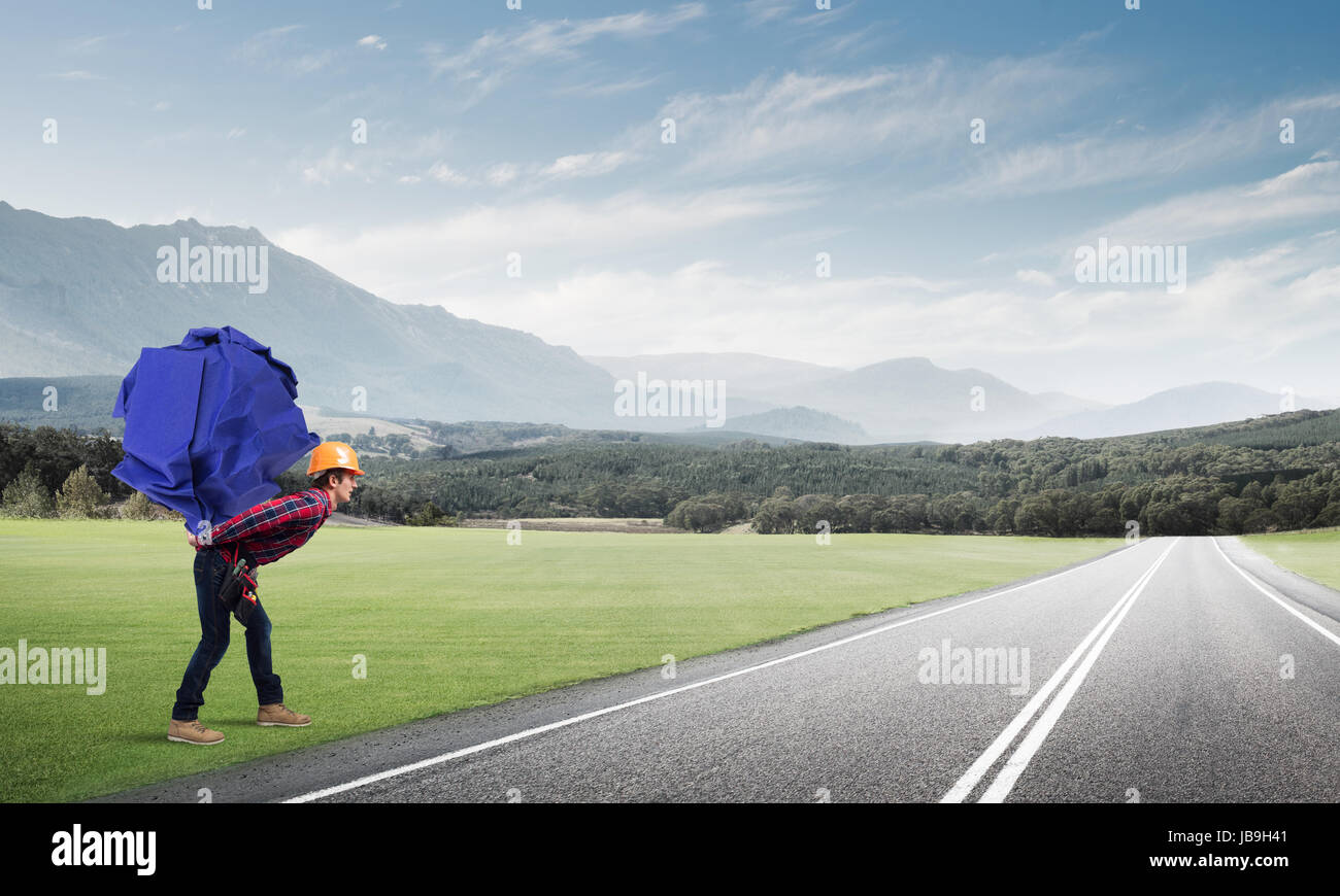 Engineer man carry load Stock Photo - Alamy