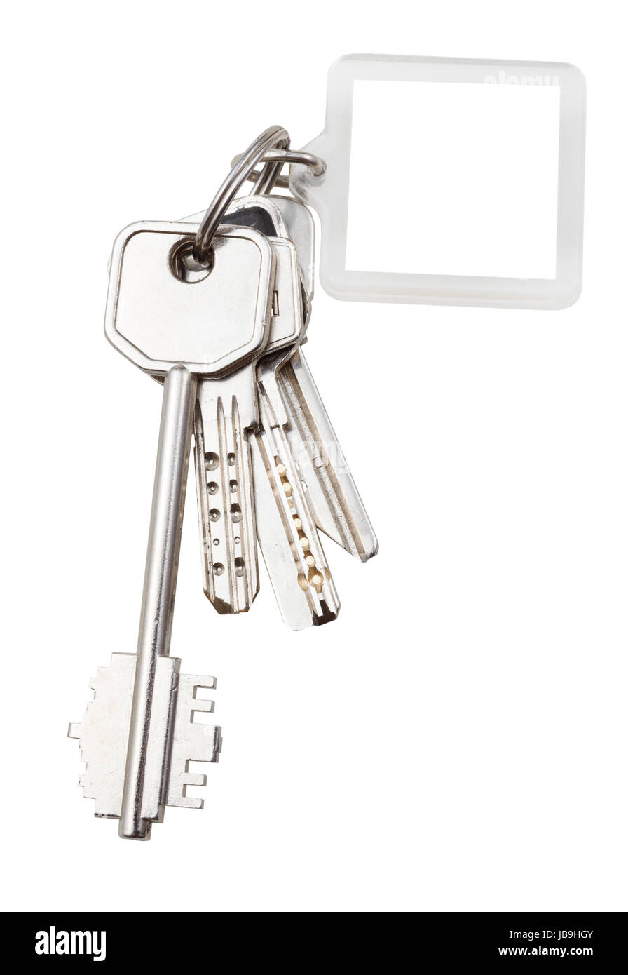 bunch of keys on steel ring and keychain isolated on white background ...