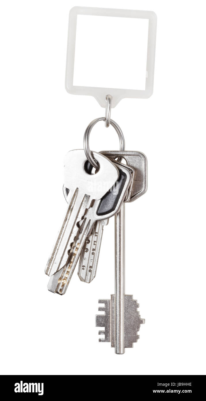 bunch of keys on ring and square keychain isolated on white background ...