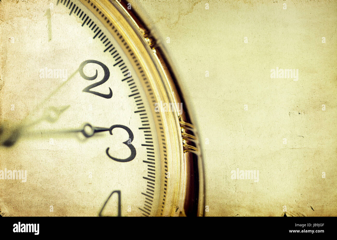 Old golden clock on vintage background Stock Photo - Alamy