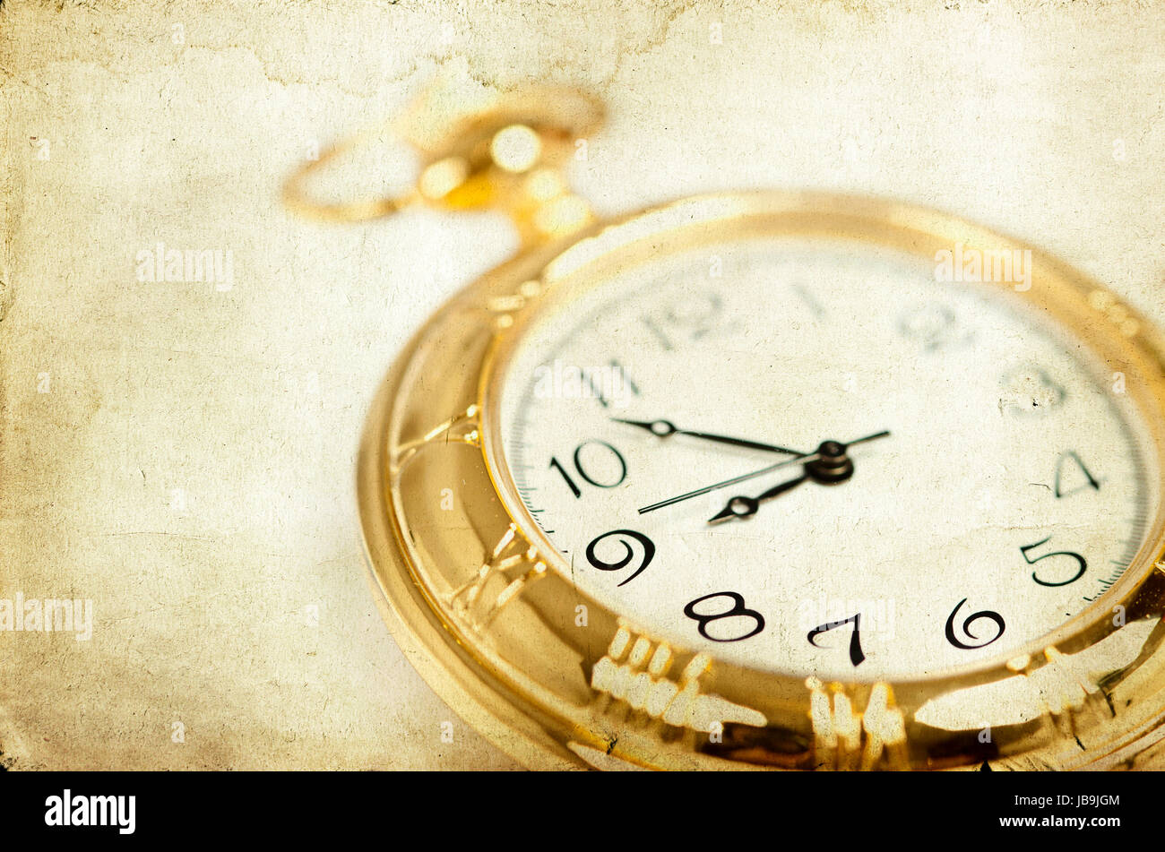 Old golden clock on vintage background Stock Photo - Alamy