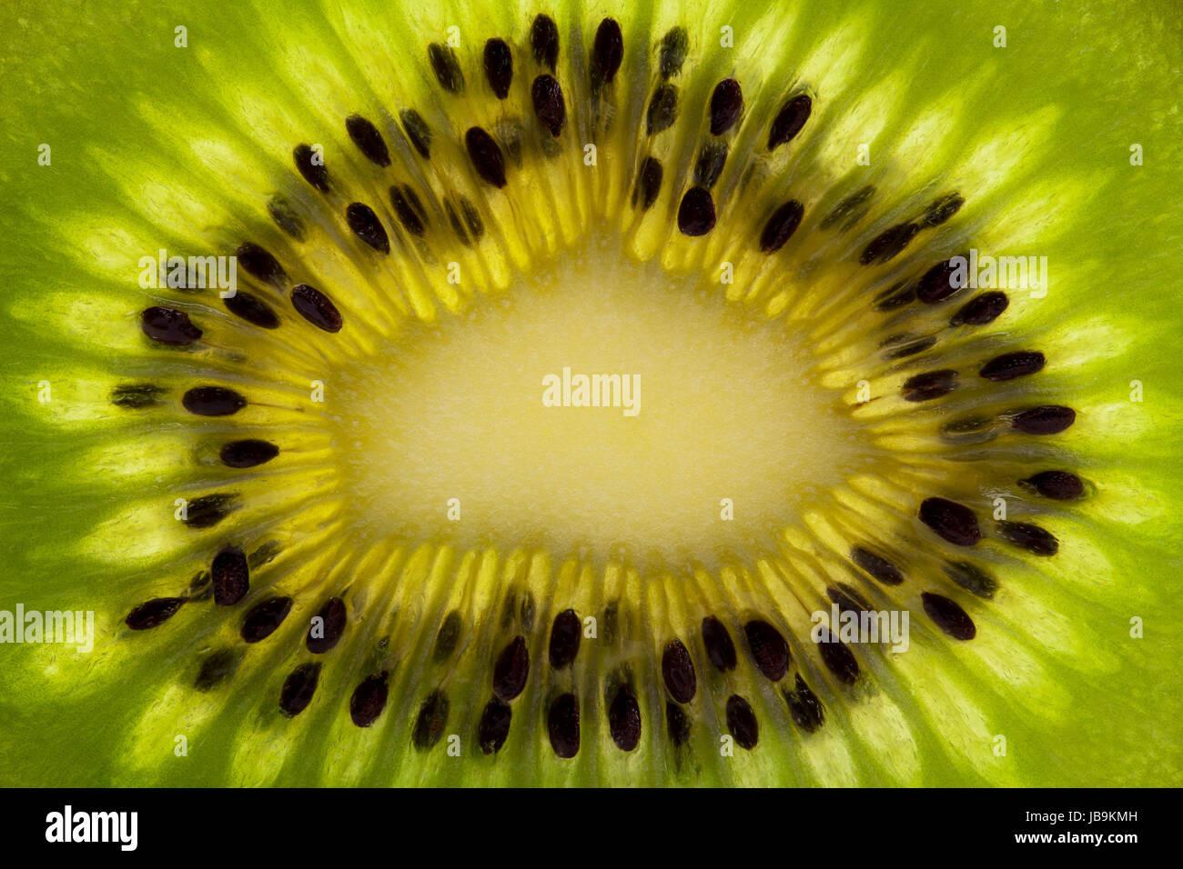 fruit of fresh green sliced kiwi macro Stock Photo - Alamy