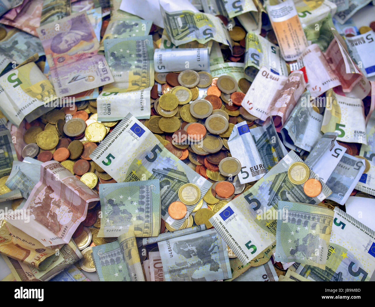 Euro banknote and coin (currency of the European Union Stock Photo - Alamy