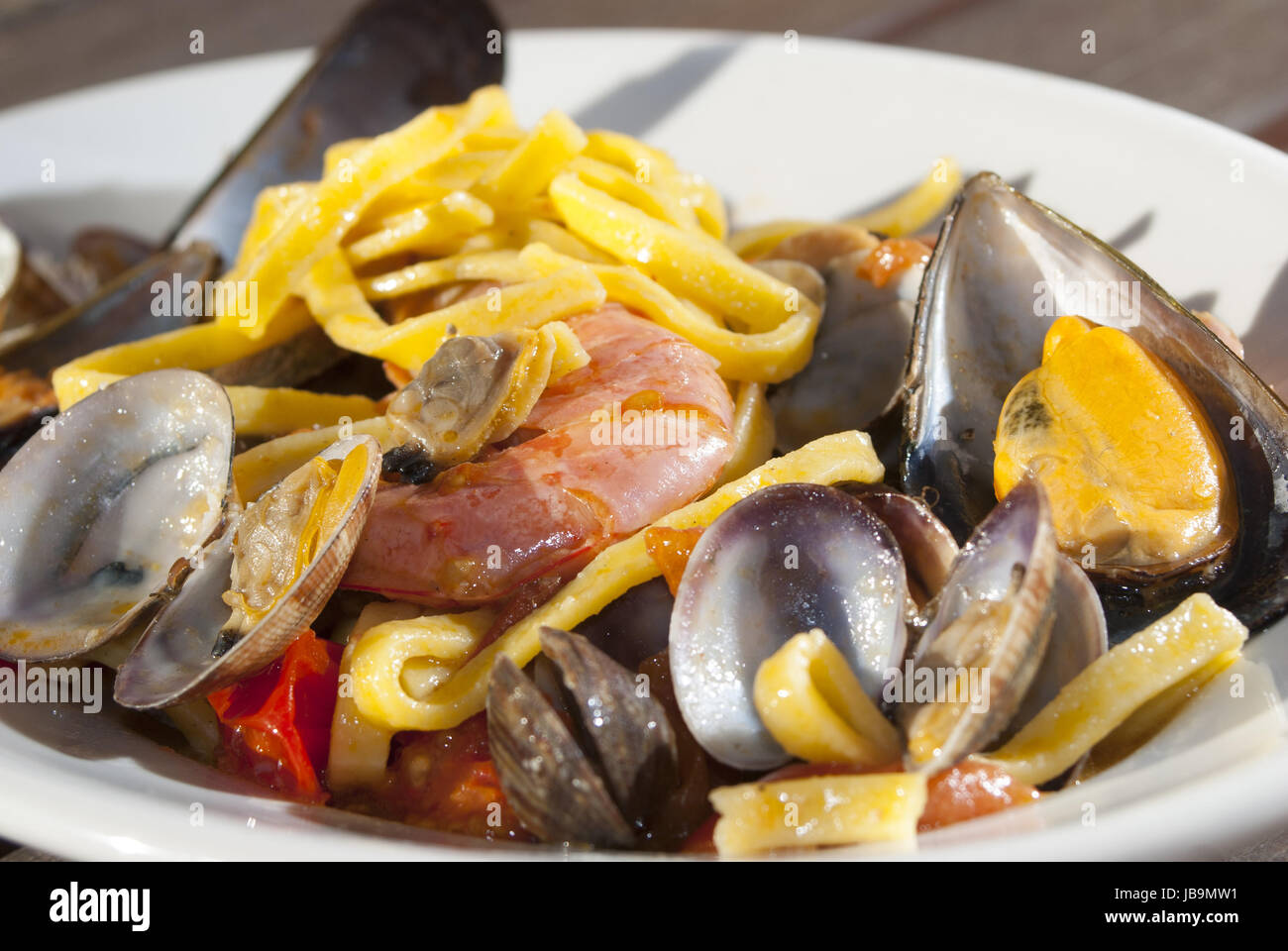 a traditional Italian sea dish: linguine allo scoglio Stock Photo - Alamy