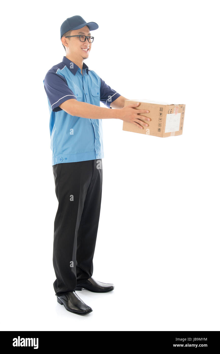Delivery person delivering package smiling happy in blue uniform ...