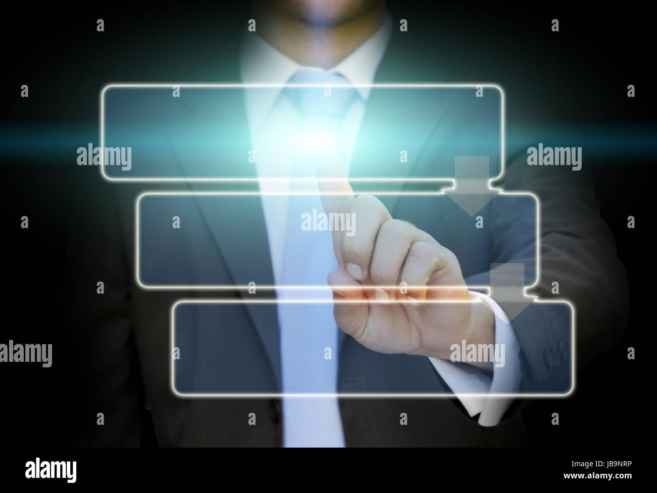 Businessman using digital interface with his fingers Stock Photo - Alamy