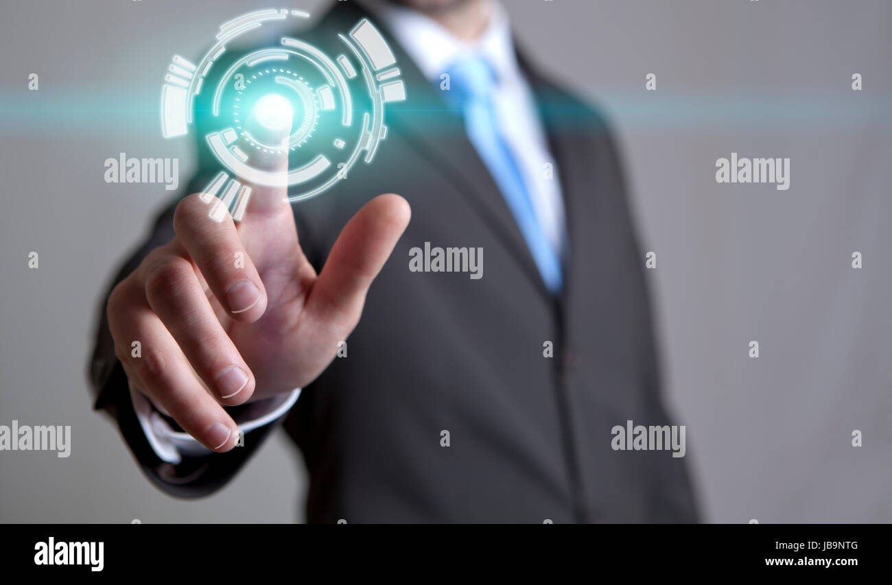Businessman using digital interface with his fingers Stock Photo - Alamy