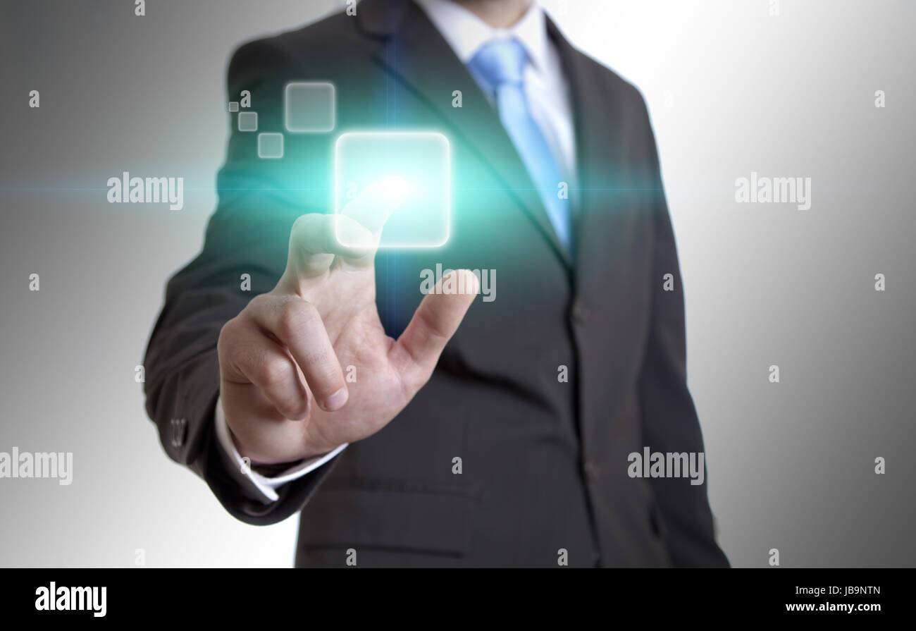 Businessman using digital interface with his fingers Stock Photo - Alamy
