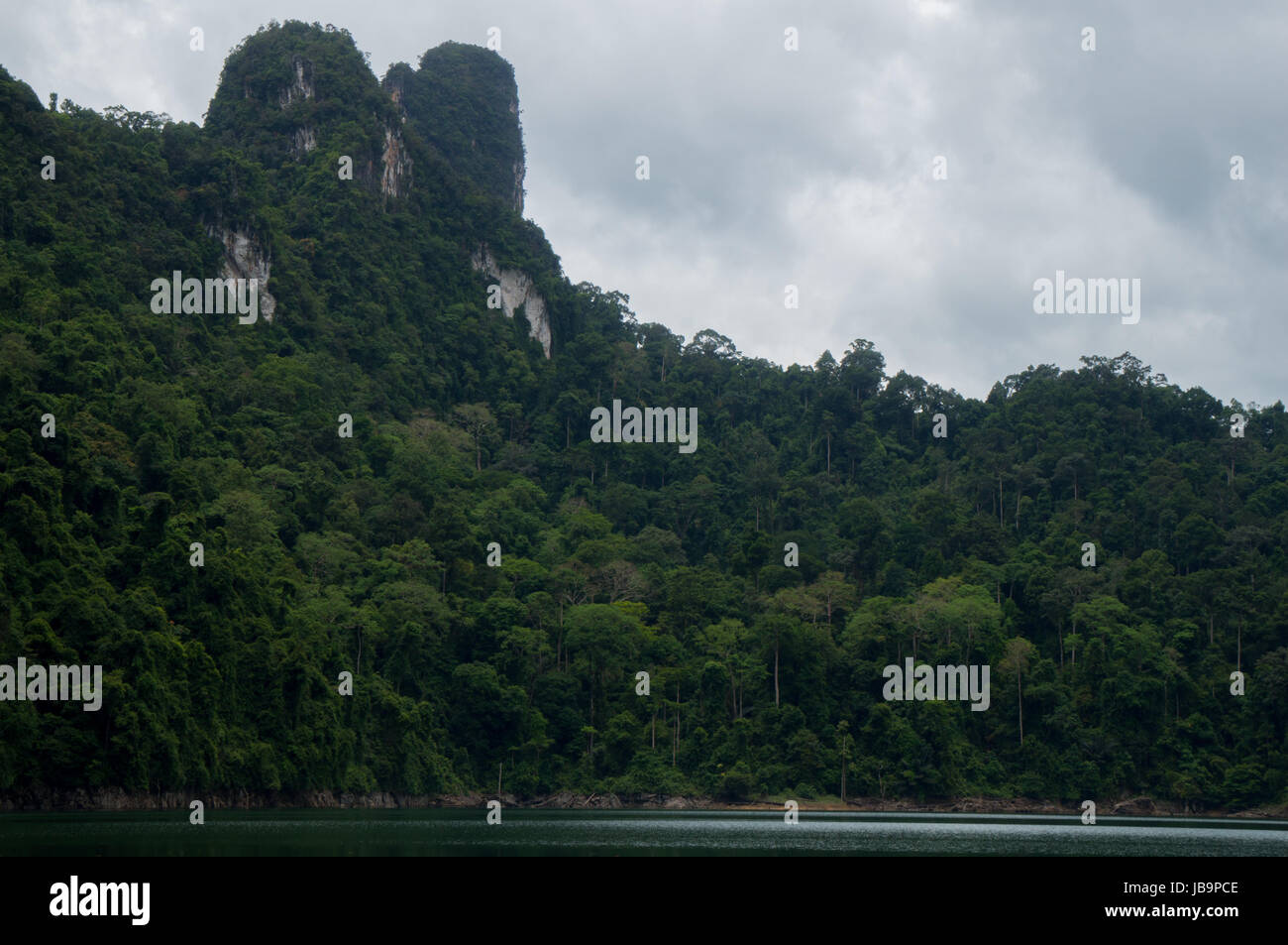 Massive karst formations rising out of Cheow Lan Lake Stock Photo - Alamy