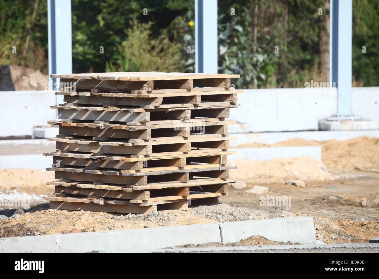 Stack of wooden pallets. Make a pathway - outdoor Stock Photo - Alamy