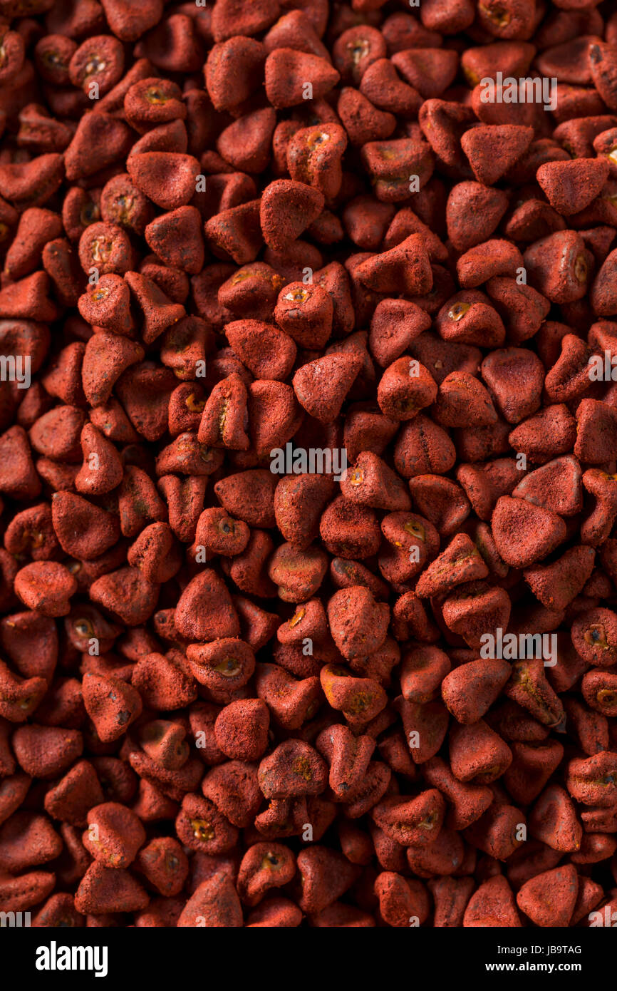 Raw Red Organic Annatto Seeds in a Bowl Stock Photo - Alamy