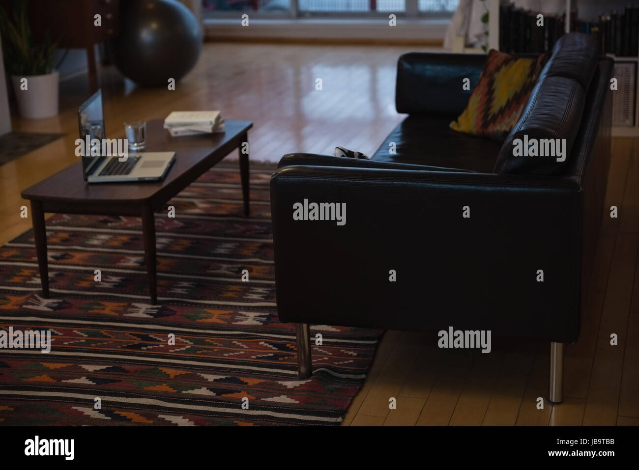 Empty sofa in living room at home Stock Photo - Alamy
