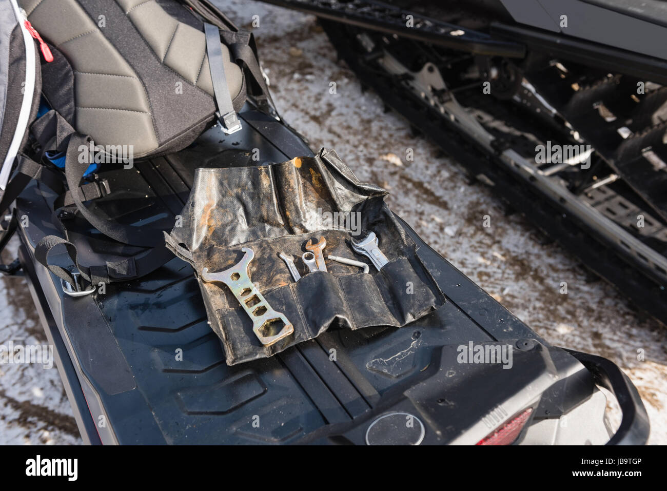 Various tools kept in case on snowmobile during winter Stock Photo - Alamy